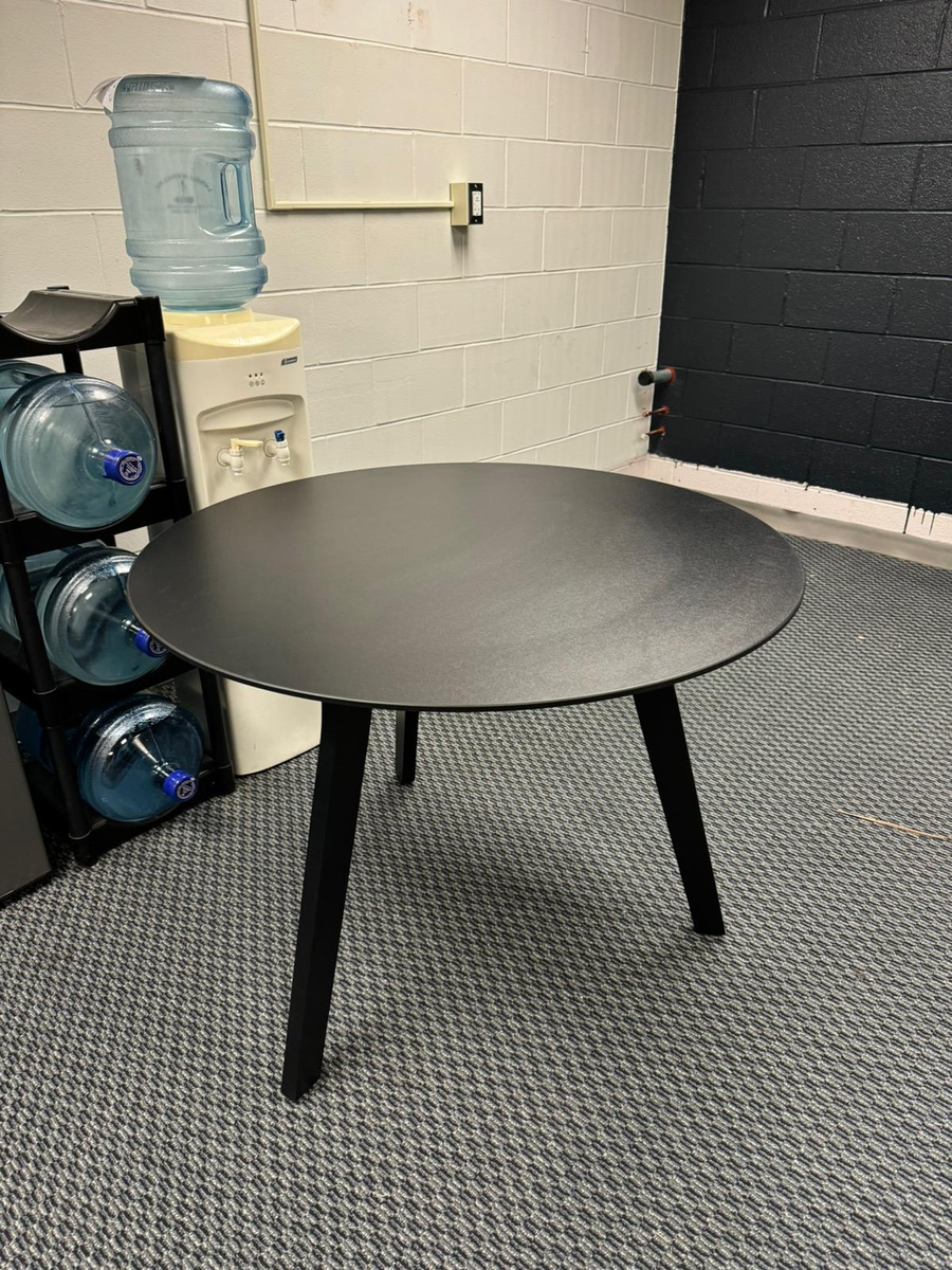 Slick Black Round Meeting Table - Officestock